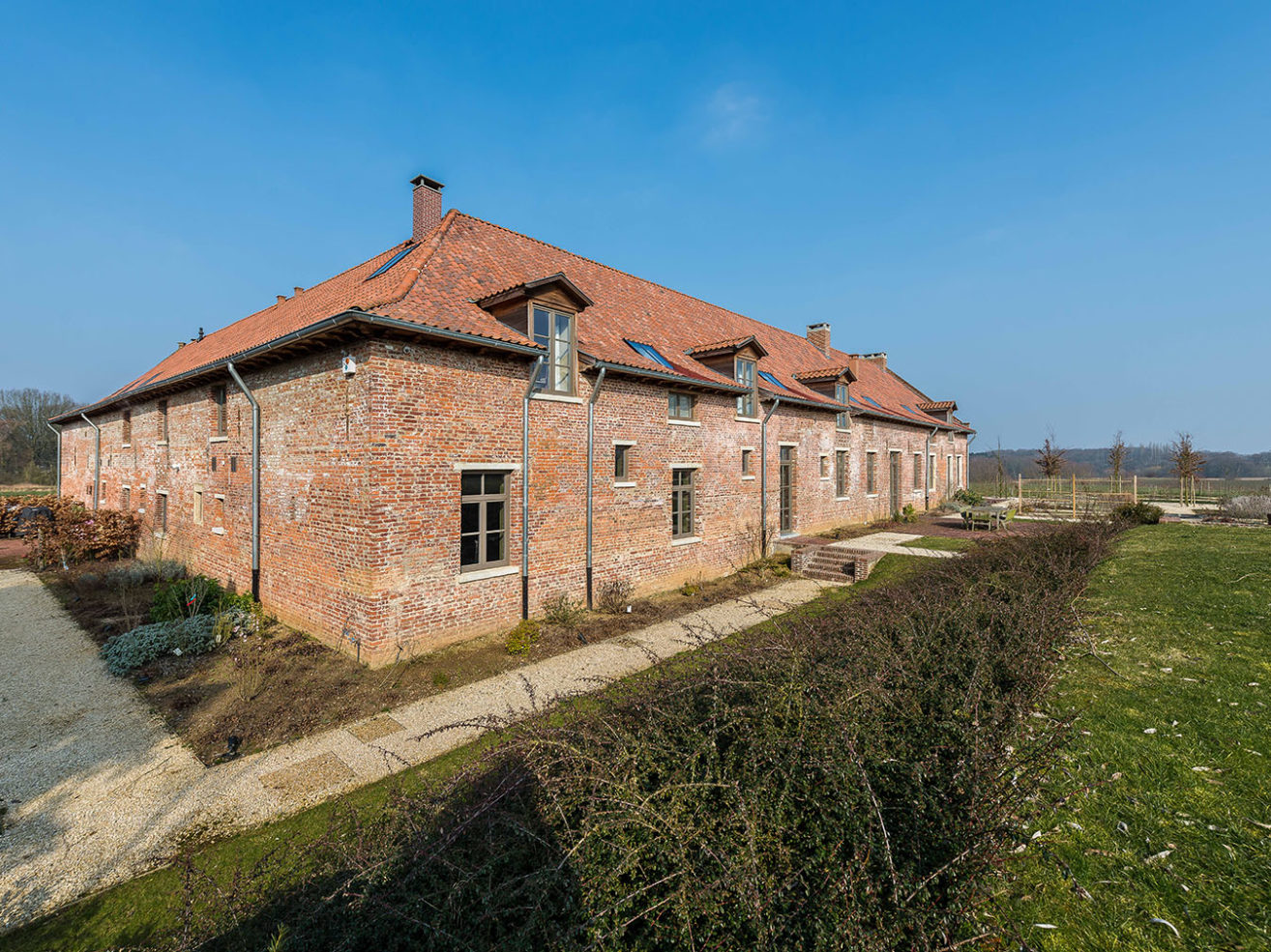 Revamped Belgian farmhouse has a colourful twist - The Spaces