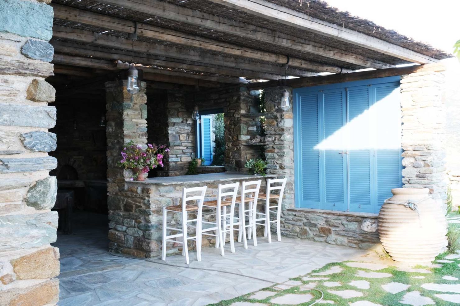 Explore a cliffside Cycladic villa on the Greek island of Andros - The ...
