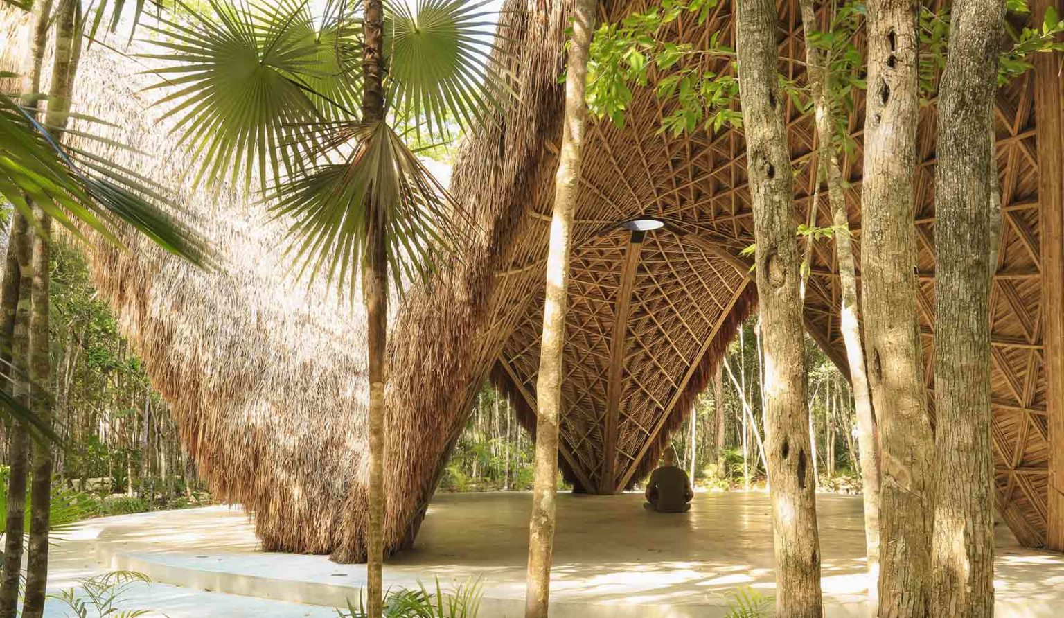 This bamboo-covered pavilion is a yoga studio in the middle of the ...