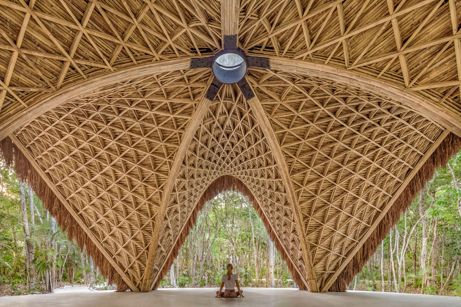 This bamboo-covered pavilion is a yoga studio in the middle of the ...