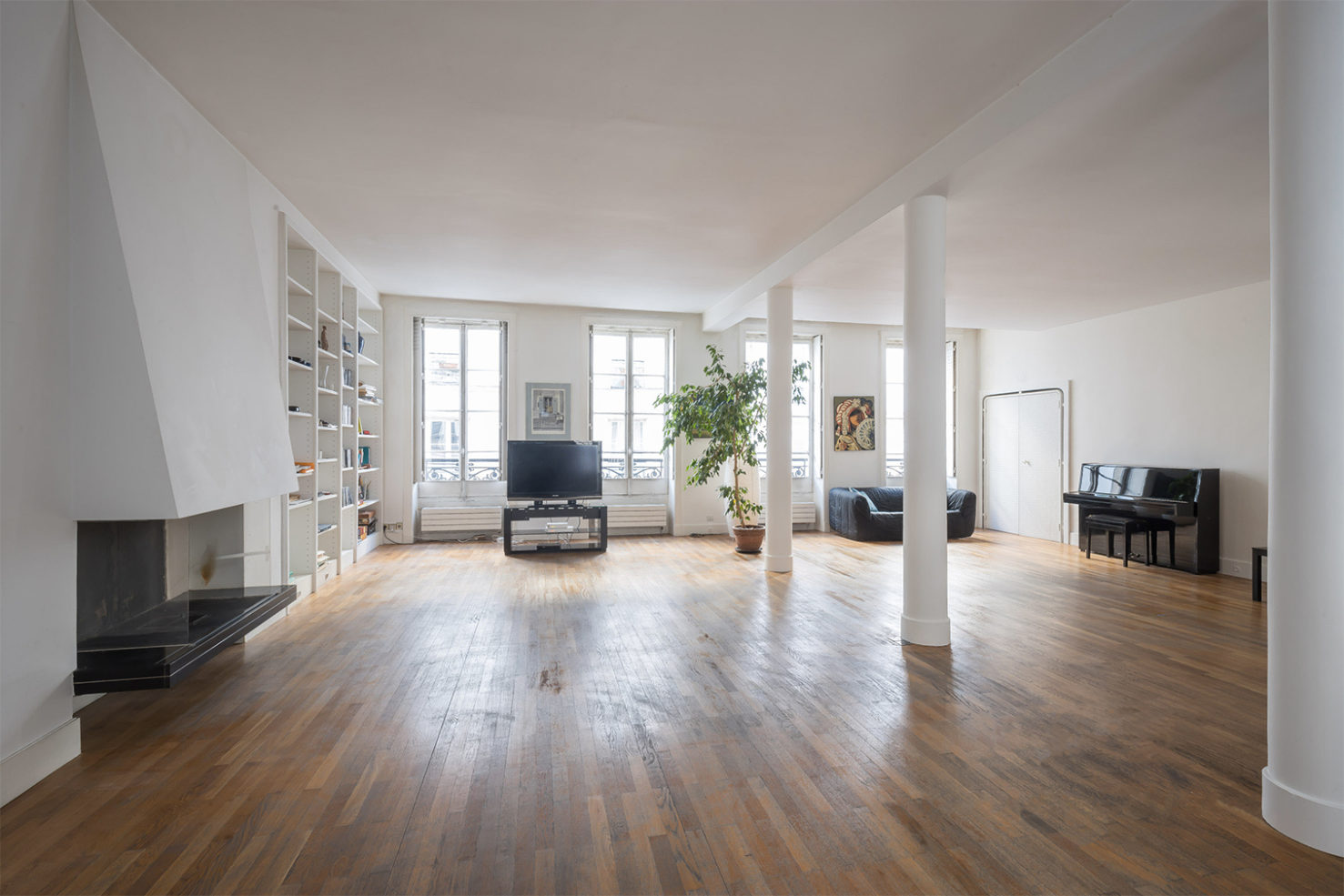 This €2.39m Paris duplex is an instant win for book-lovers - The Spaces
