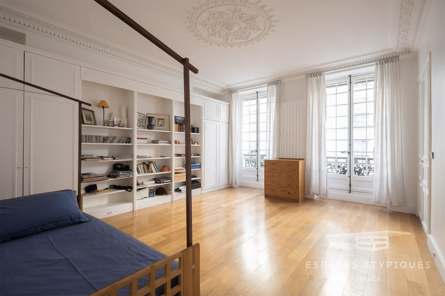 This €2.39m Paris duplex is an instant win for book-lovers - The Spaces