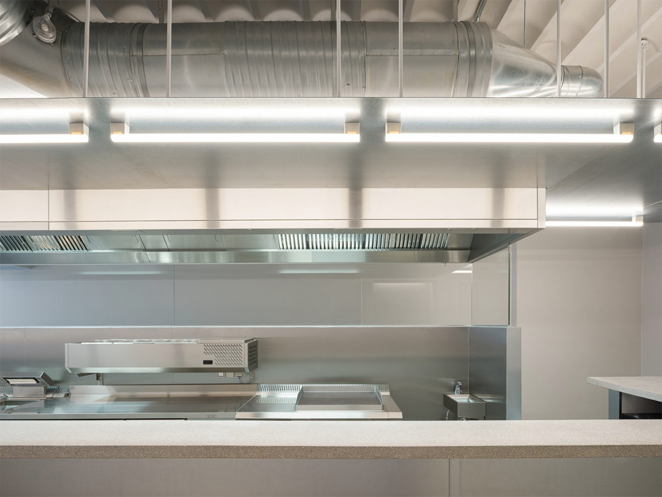 This minimalist concept store is actually a burger joint - The Spaces