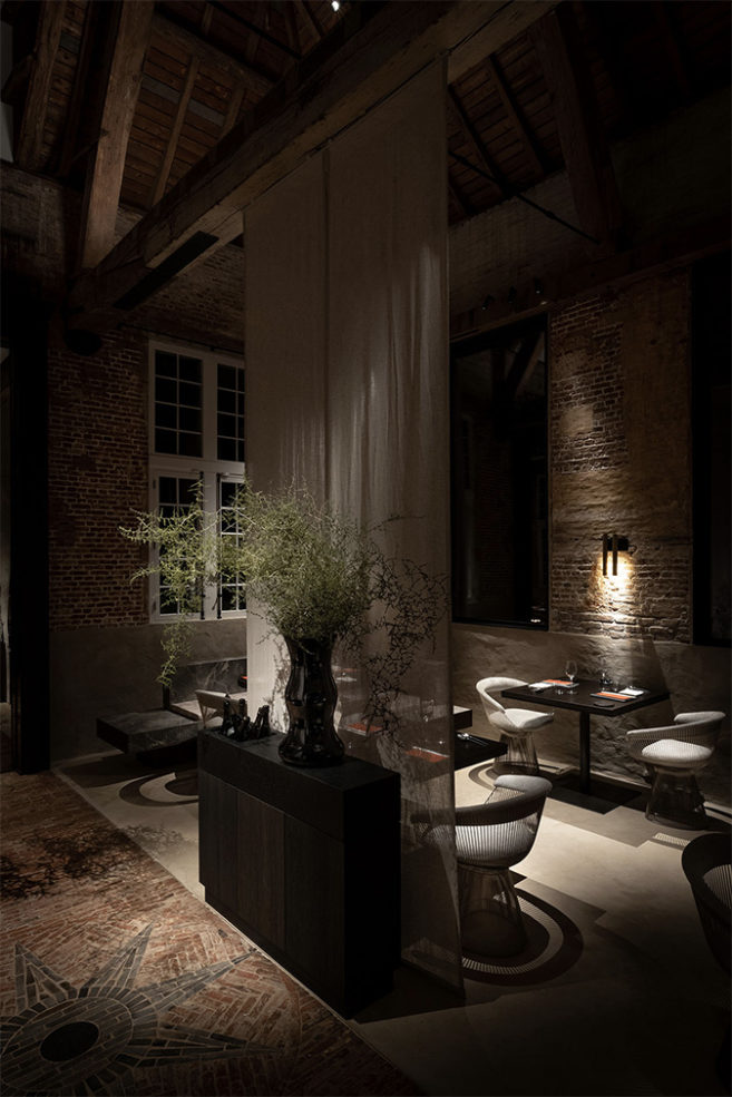 Patinaed brickwork sets the tone inside Antwerp's Stable restaurant ...