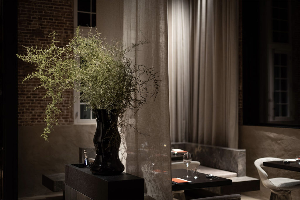 Patinaed brickwork sets the tone inside Antwerp's Stable restaurant ...