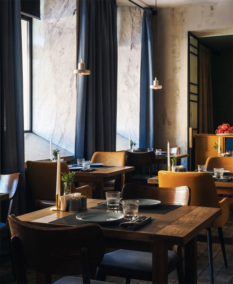 A moody colour palette sets the tone at this St Petersburg restaurant ...