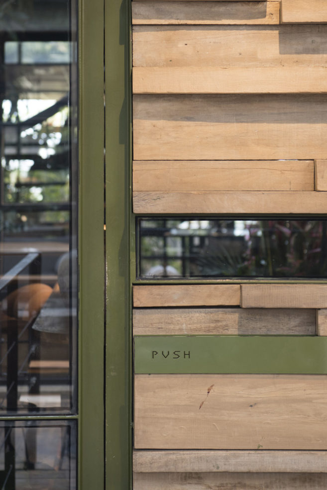 Tropical plants grow inside this jungle-themed restaurant just outside ...