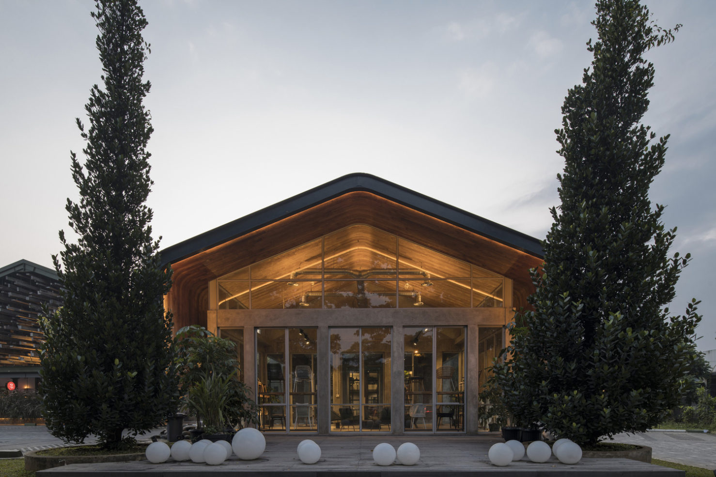 Tropical plants grow inside this jungle-themed restaurant just outside ...