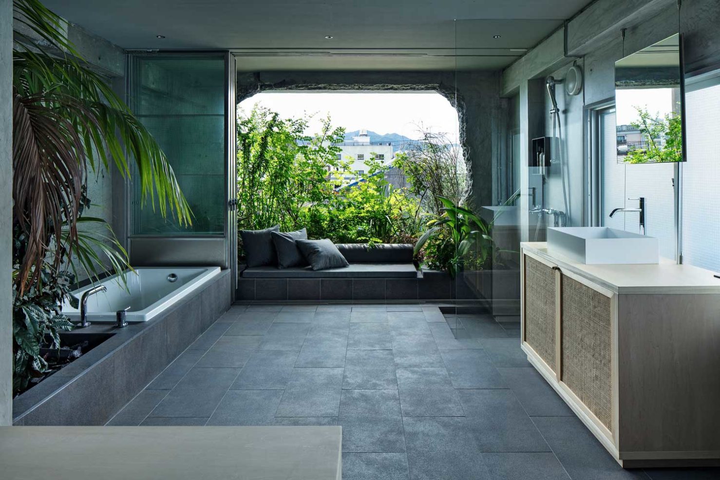 Windows at Fukue Island’s Hotel Sou are carved out of the concrete - The Spaces