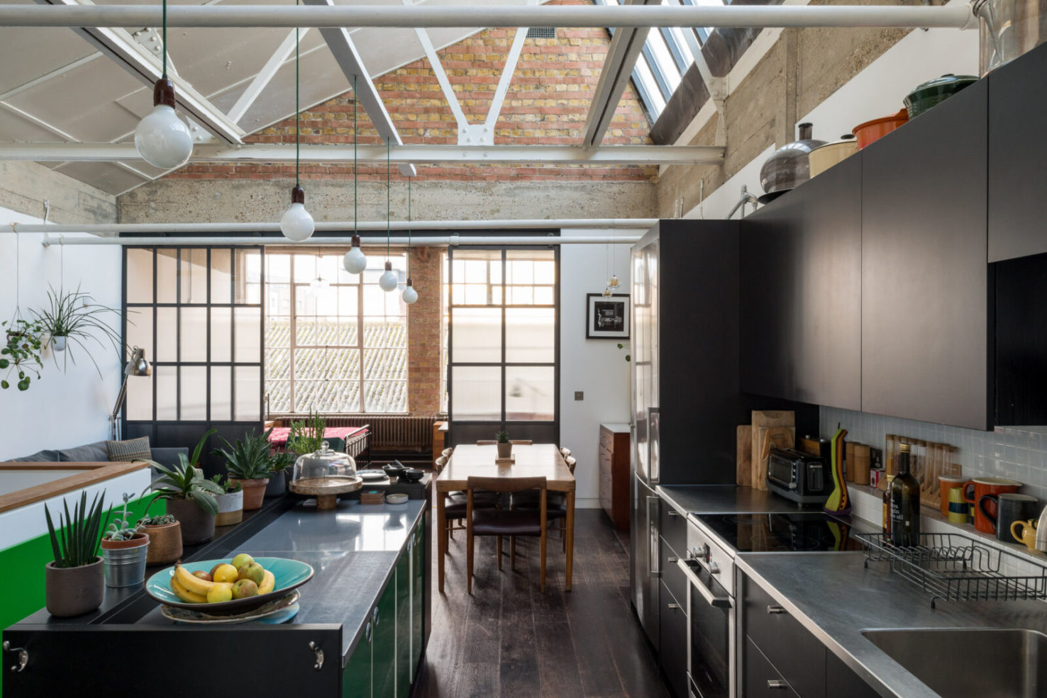 Converted shoe factory in London houses a voluminous live/work space