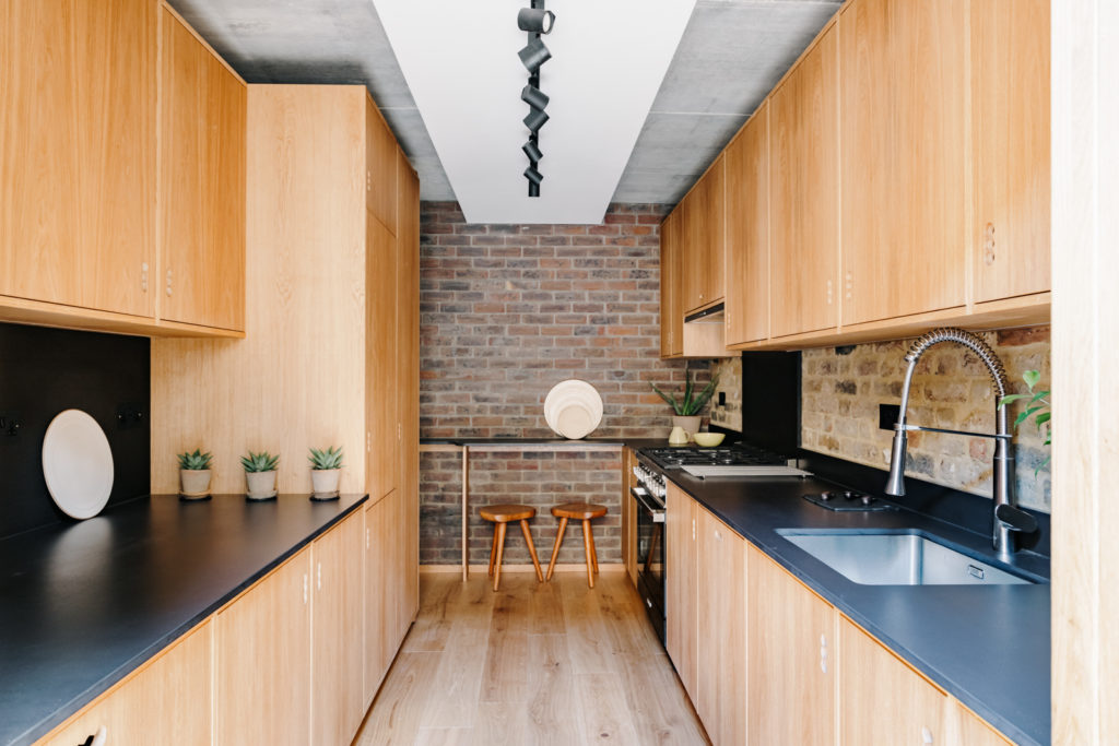 Satish Jassal Architects transforms London garage plot into a secluded ...