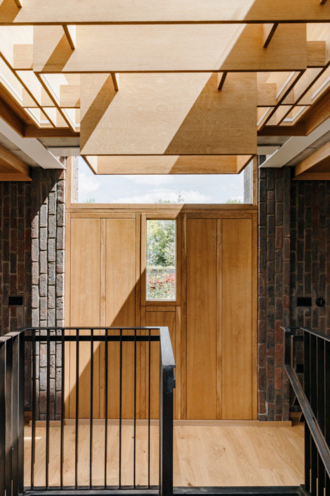 Satish Jassal Architects transforms London garage plot into a secluded ...