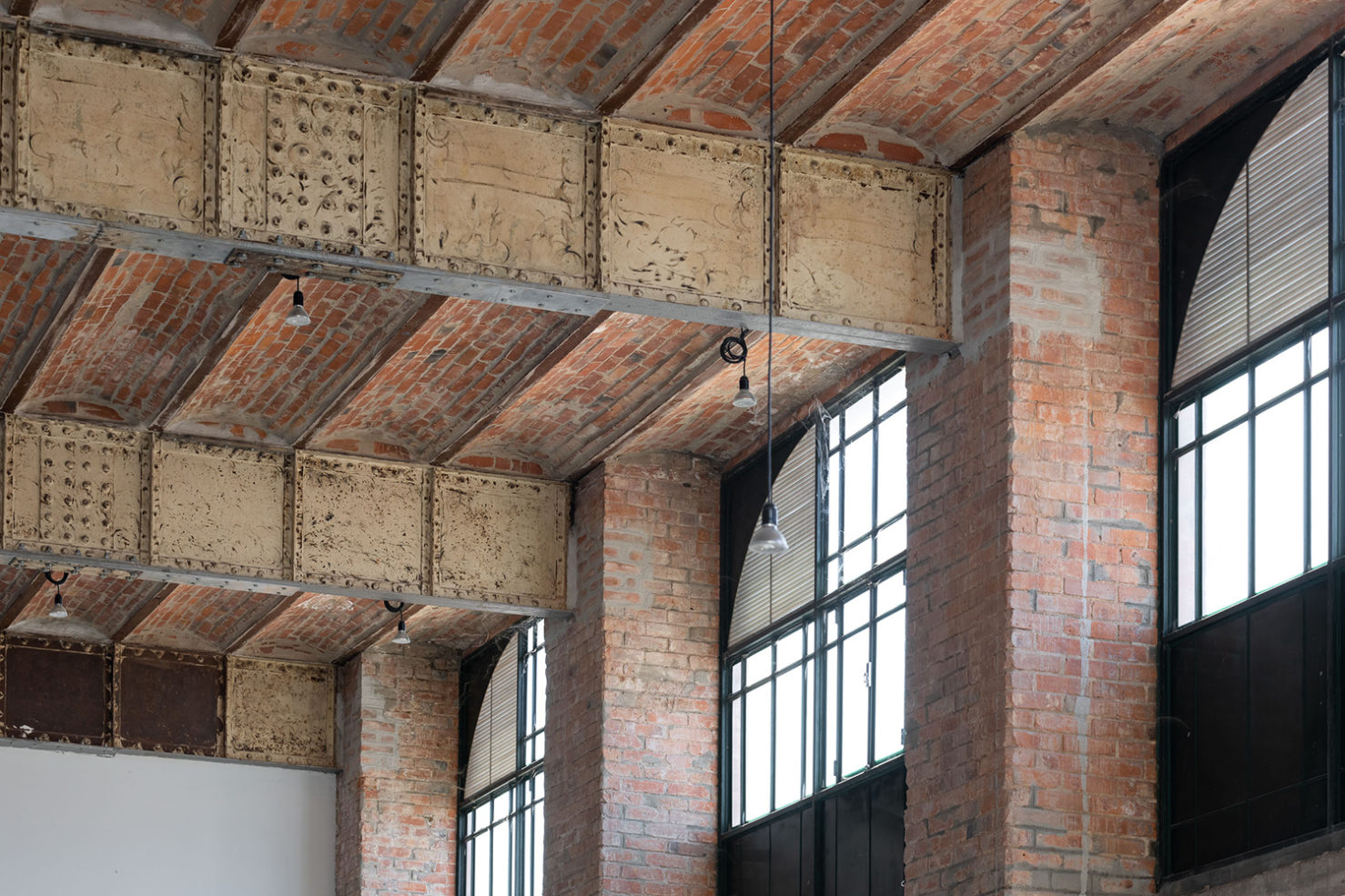 This raw (and rare) brick-vaulted Lisbon warehouse will spark your ...