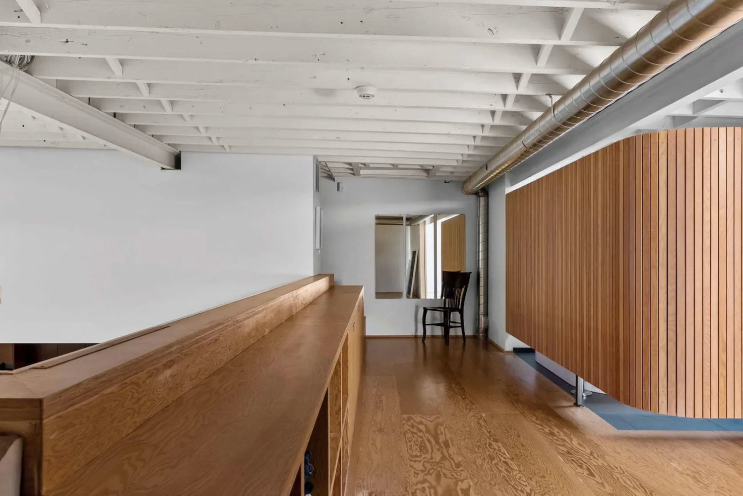 Peek inside a Toronto train-track loft with industrial proportions ...