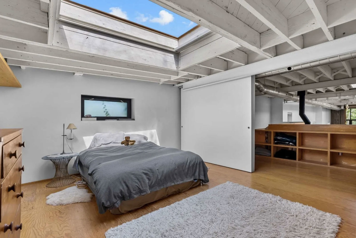 Peek inside a Toronto train-track loft with industrial proportions ...