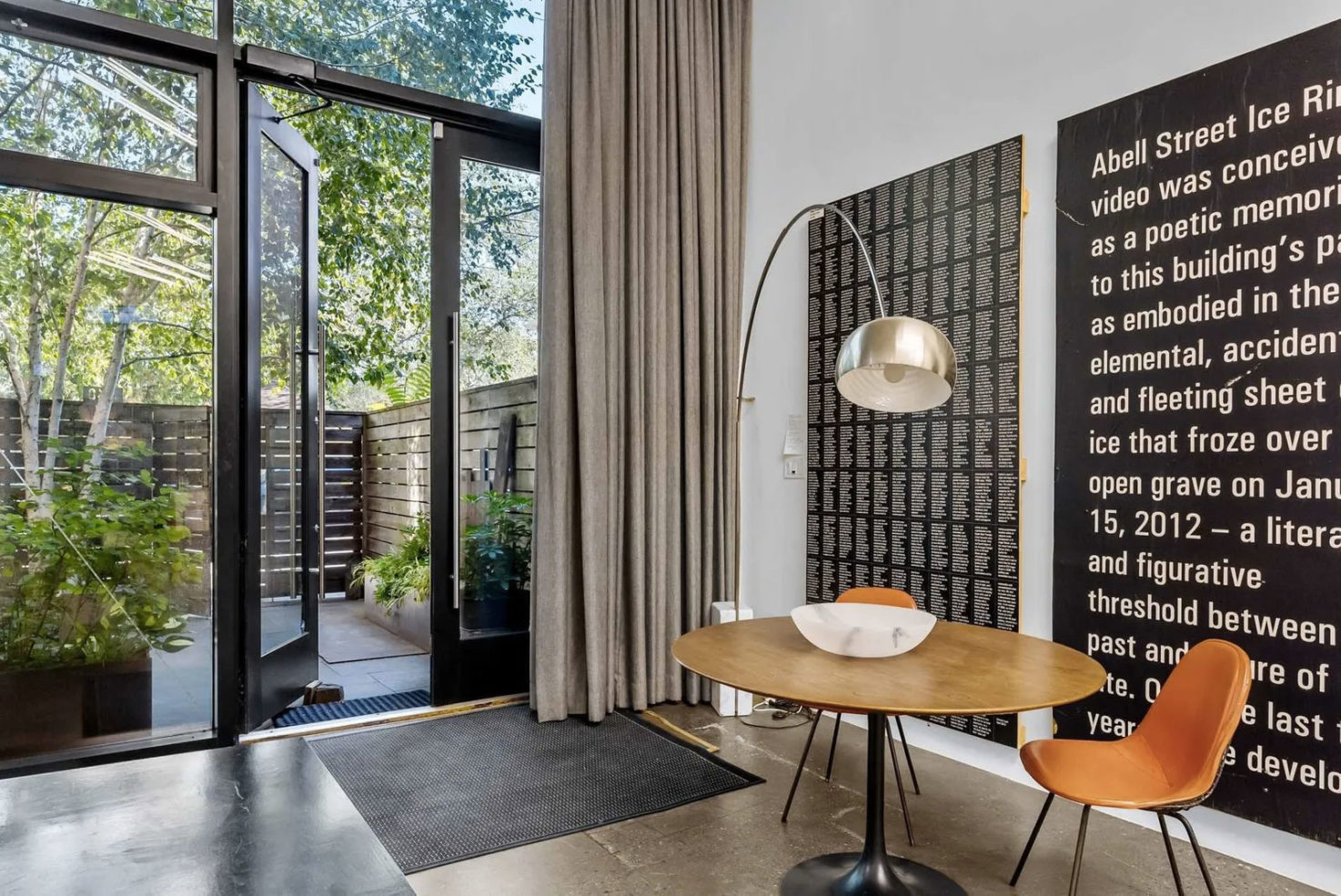 Peek inside a Toronto train-track loft with industrial proportions ...