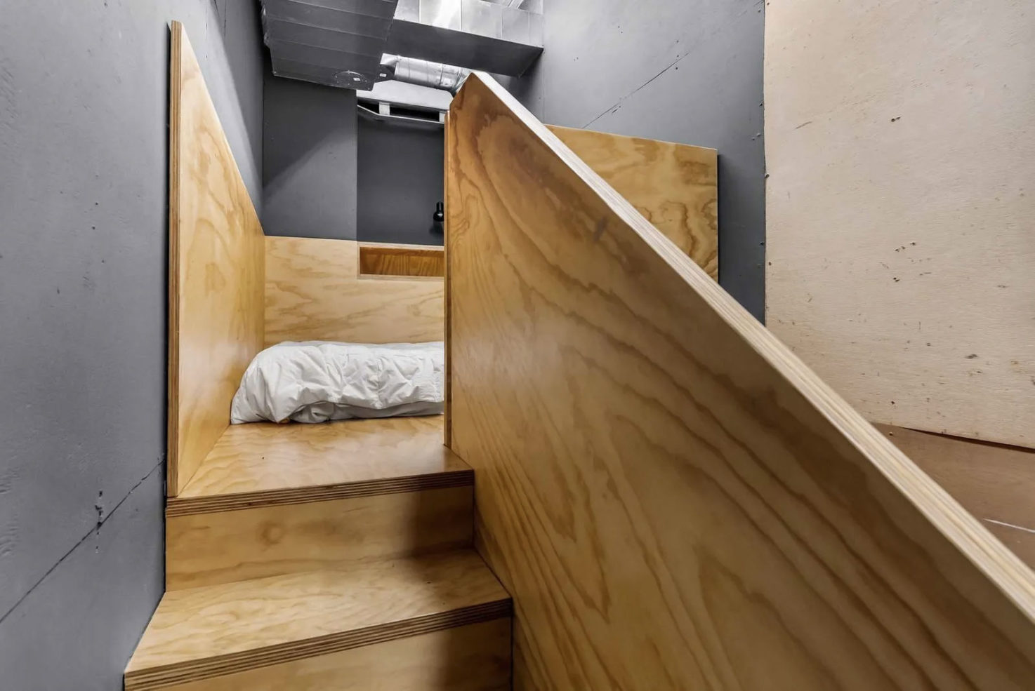 Peek inside a Toronto train-track loft with industrial proportions ...