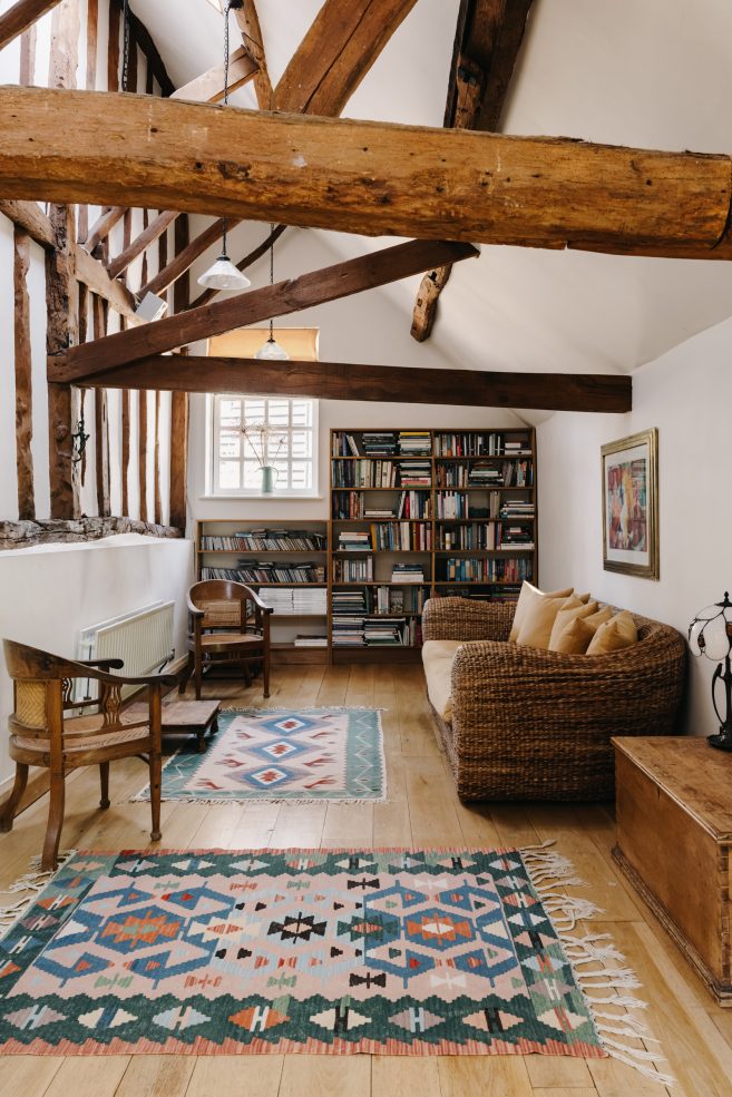 This converted coach house sleeps 10 under original wood beams - The Spaces