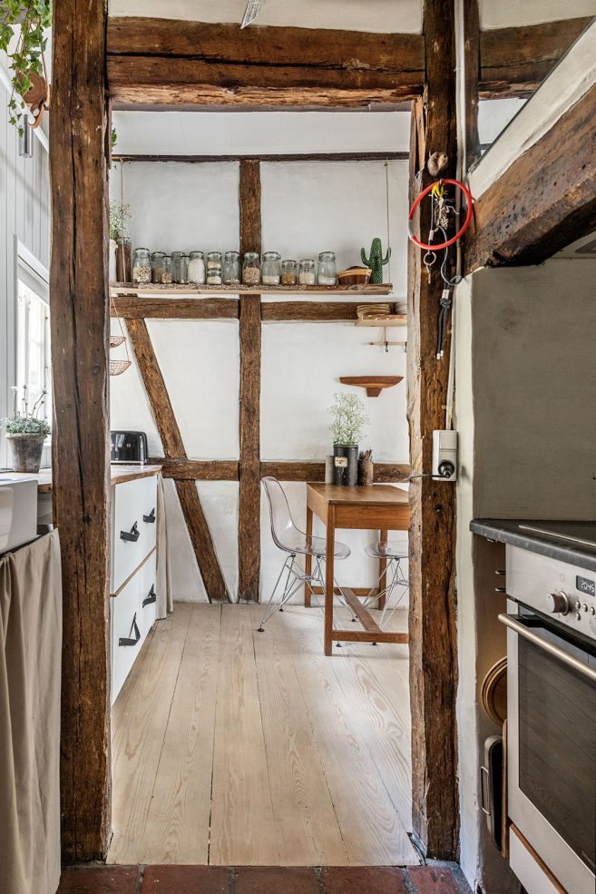 Peek inside a tiny Copenhagen loft with timbered ceilings and walls ...