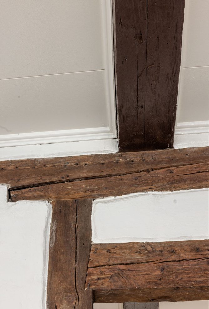 Peek inside a tiny Copenhagen loft with timbered ceilings and walls ...