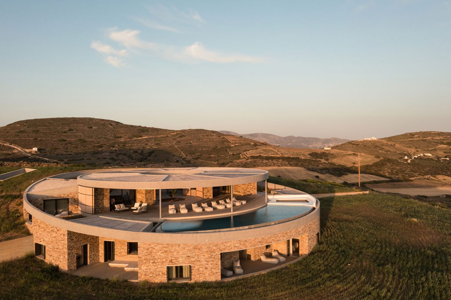 Circular Greek island home celebrates the landscape with its striking ...