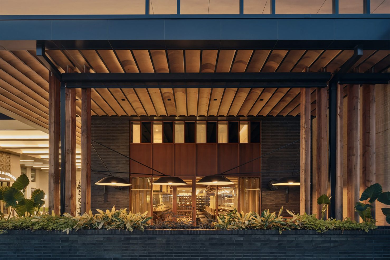 Uchiko Houston’s walnut interiors and sunken hearth evoke the warmth of ...