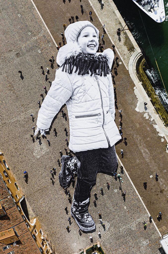 JR is opening his first solo show in Italy