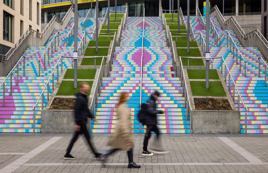 Artists daub the steps of Wembley Park in a joyful street mural for ...