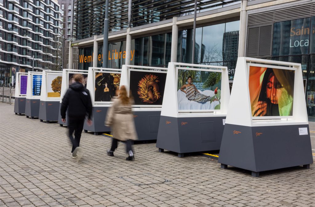 Artists daub the steps of Wembley Park in a joyful street mural for ...