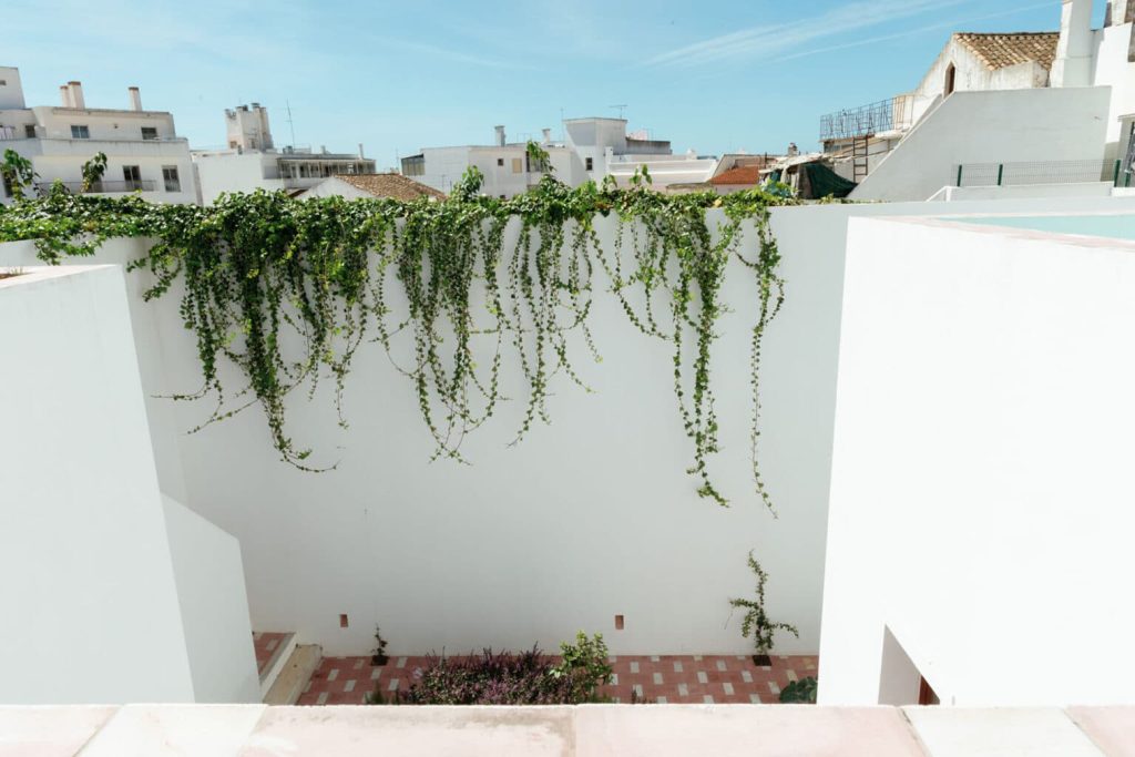 At this Faro townhouse, an extravagant facade hides minimalist ...