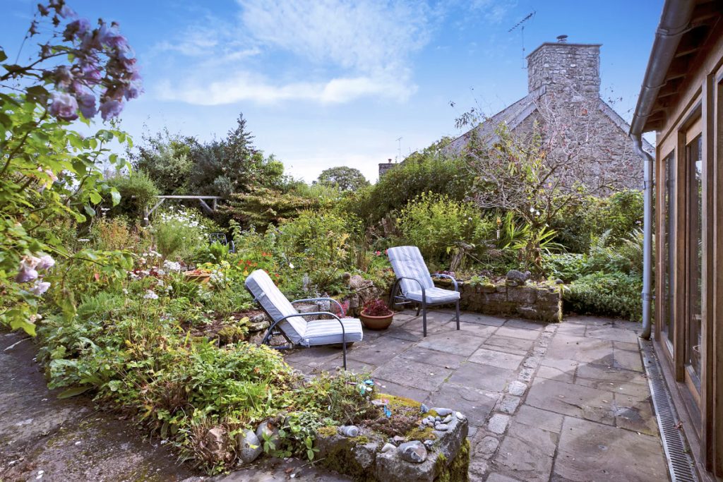 This traditional thatched Devon cottage has bags of history – and ...