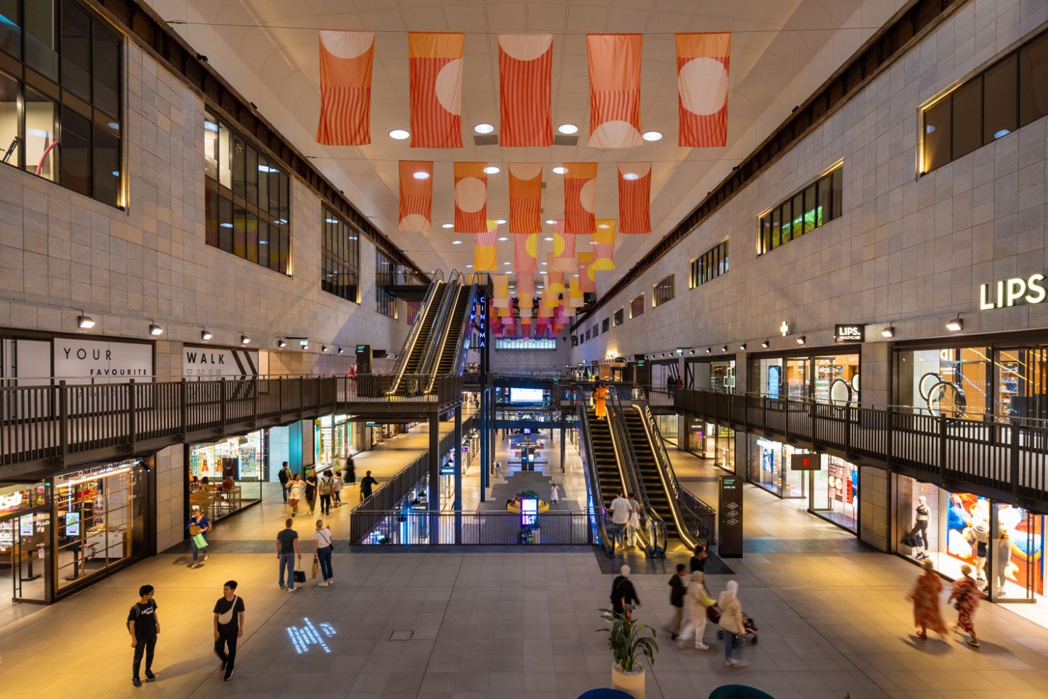Colourful banners chart the sun inside Battersea Power Station this ...