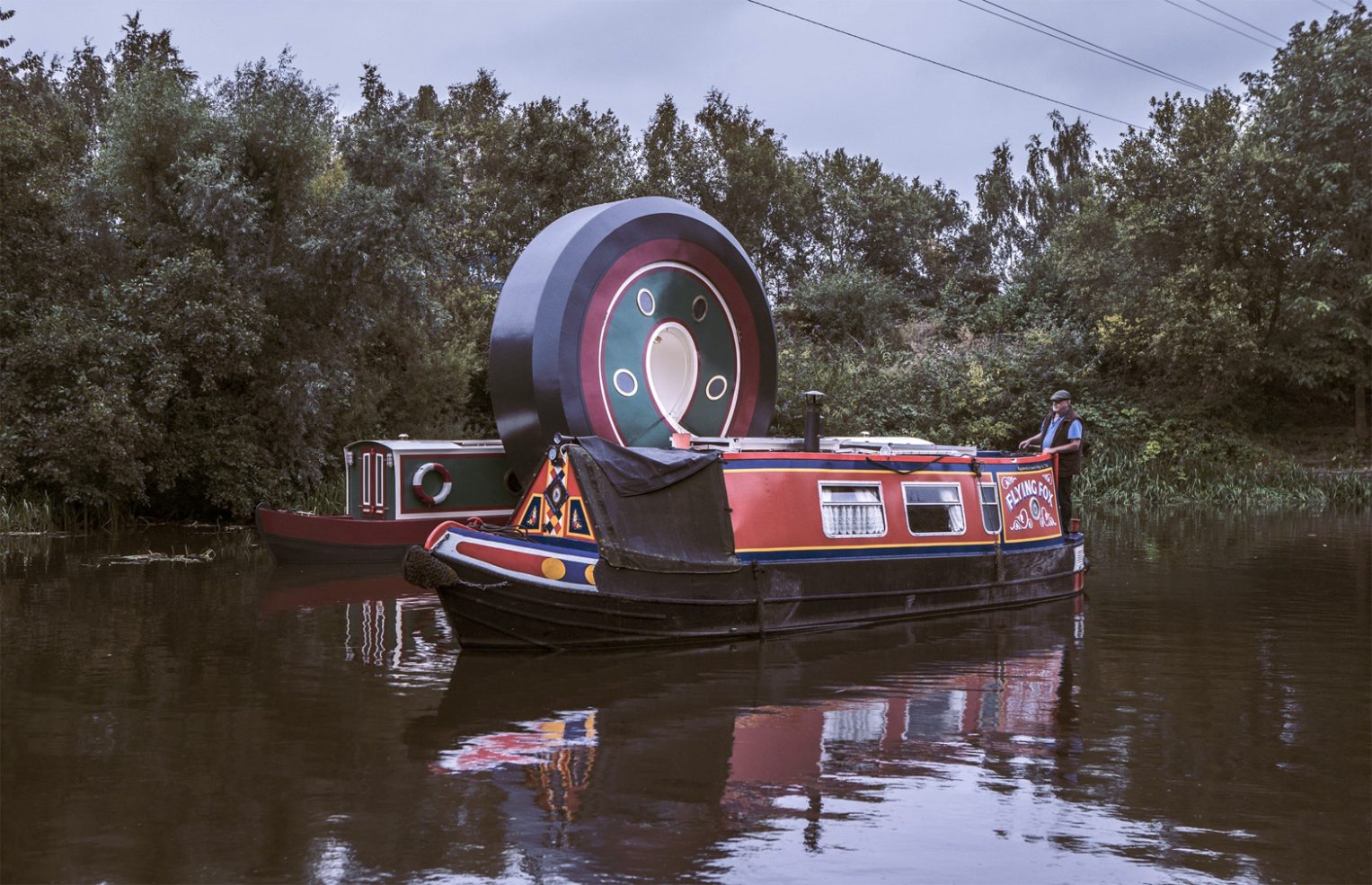 Alex Chinneck’s peculiar canal boat features a 'loop-the-loop' - The Spaces