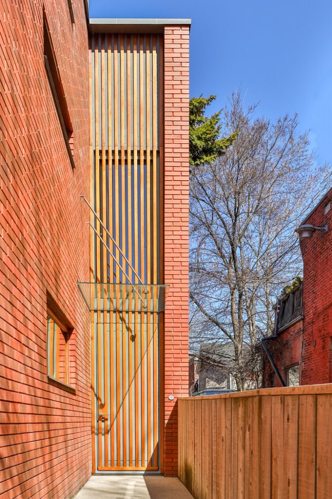 This striking brick townhouse in Toronto’s Trinity Bellwoods is a ...