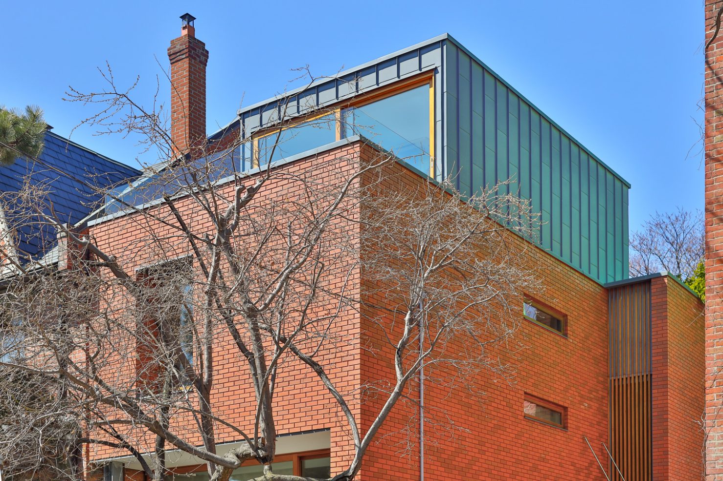 This striking brick townhouse in Toronto’s Trinity Bellwoods is a ...