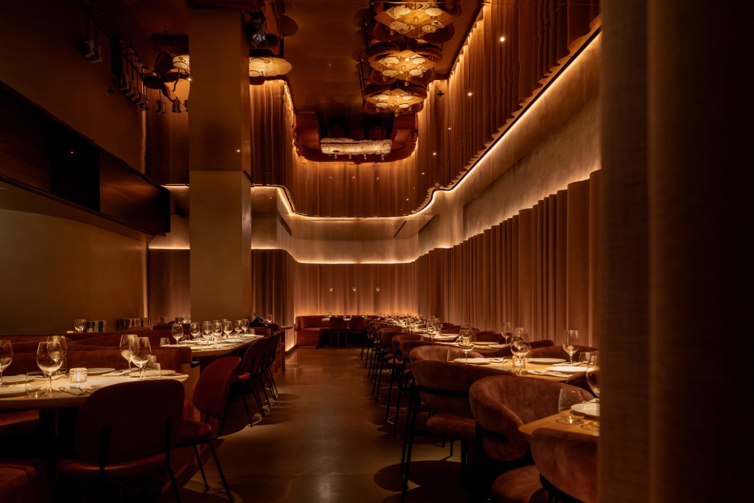 A sexy steakhouse lures diners into underground London - The Spaces