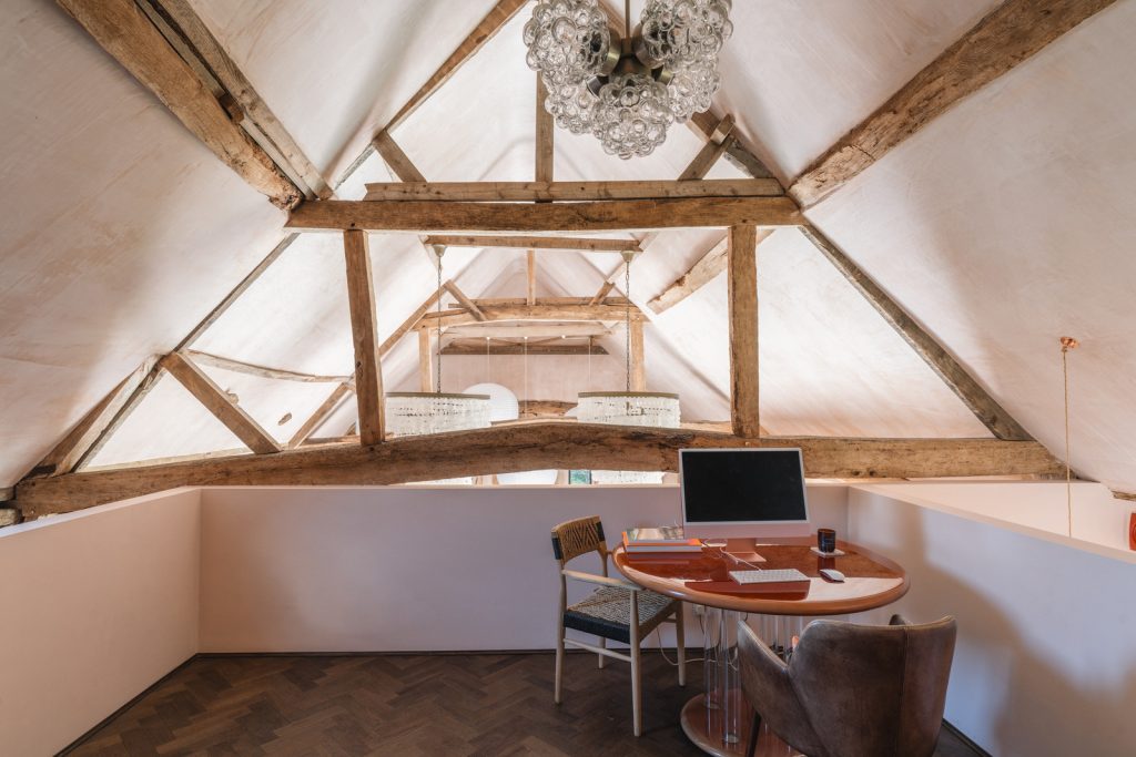 North of London, a Grade II-listed barn is reshaped through adaptive ...